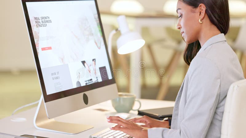 Web or Graphic Designer Typing on a Computer and Designing a Website in ...