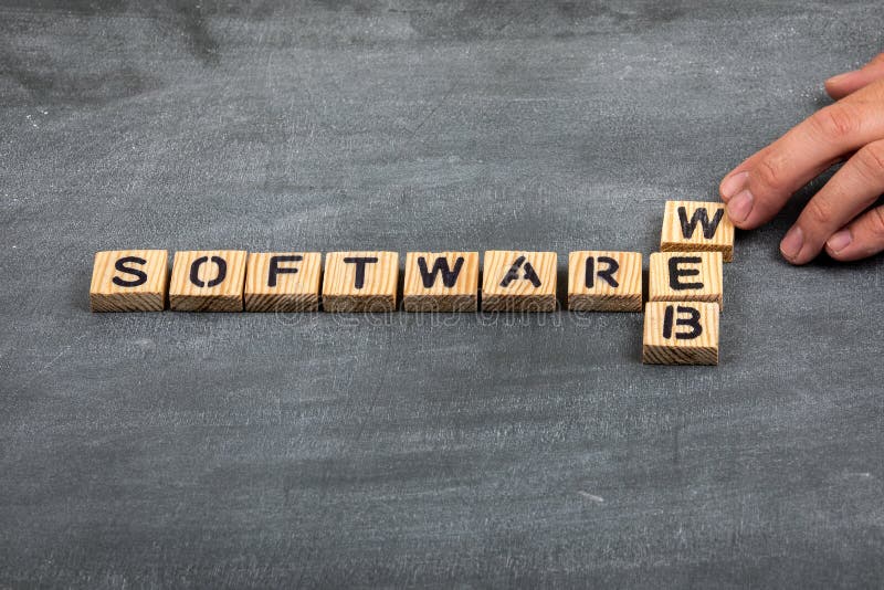 Web Software Concept. Wooden Alphabet Letters on a Black Chalk Board ...