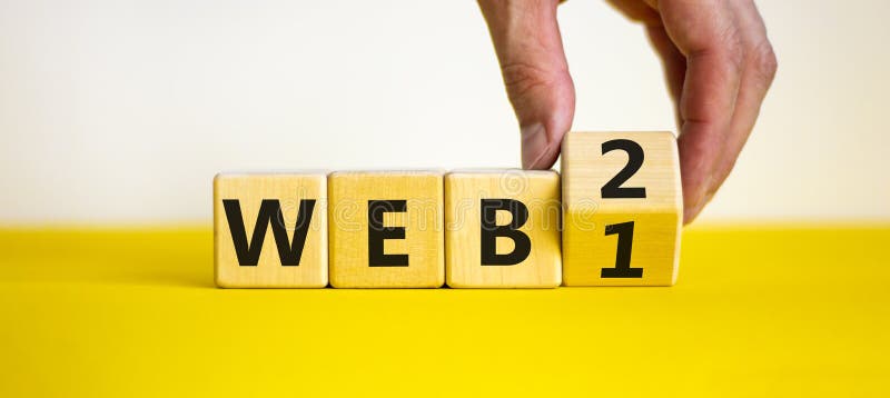 WEB 1 or 2 Symbol. Businessman Turns a Wooden Cube and Changes Words ...