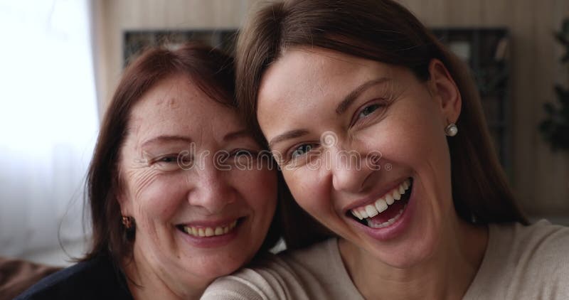 Top View Mom And Daughter Leaf Through The Wedding Photobook Stock Video Video Of Magazine