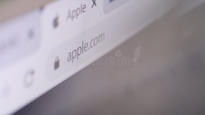 Apple Inc Domain Name in Browser and Logo on the Computer Screen ...