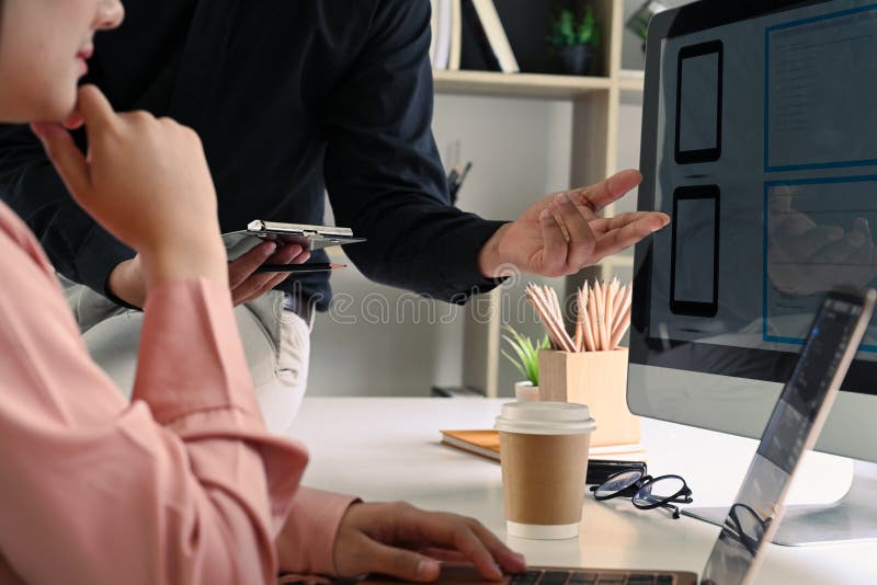 Website Development Team Working Together in Office. Stock Photo ...