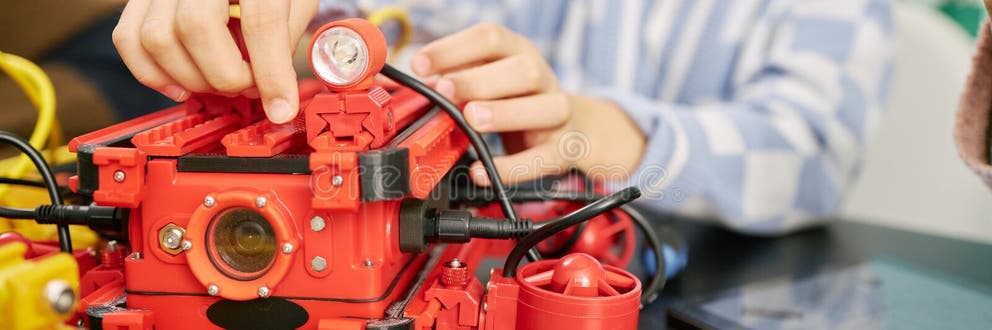 Header Image of Children Exploring Basic Robot Using Electronic Parts Stock Photo - Image of ...