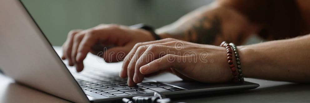 Header Image of Male Hands Typing on Keyboard of Laptop Working in ...