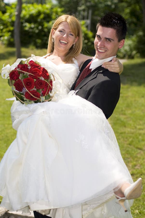 Wedding stock image. Image of flowers, woman, groom, holding - 5324375