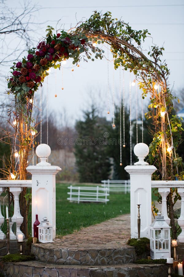 Wedding Arch with Beads, Lights and Candles. Stock Image - Image of ...