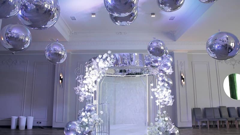 Wedding Arch at the Wedding Ceremony in Silver Tones and with Silver ...