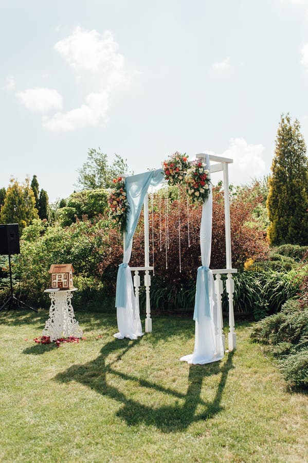 Wedding Arch and Chairs on the Grass in the Park. Stock Image - Image ...