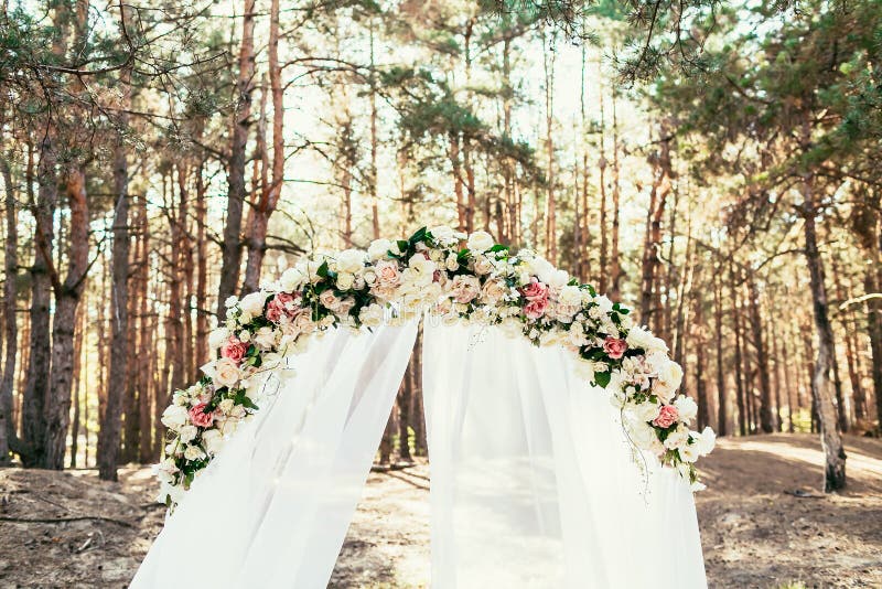 Wedding Arch with Flowers Situated in Forest on Wedding Ceremony Stock ...