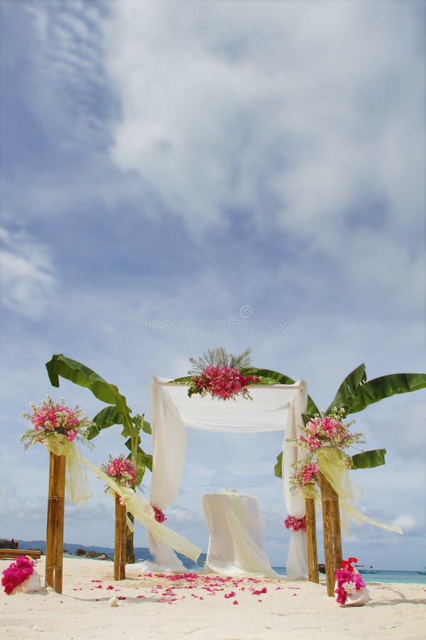 Wedding Arch and Set Up with Flowers on Tropical Beach Stock Photo ...
