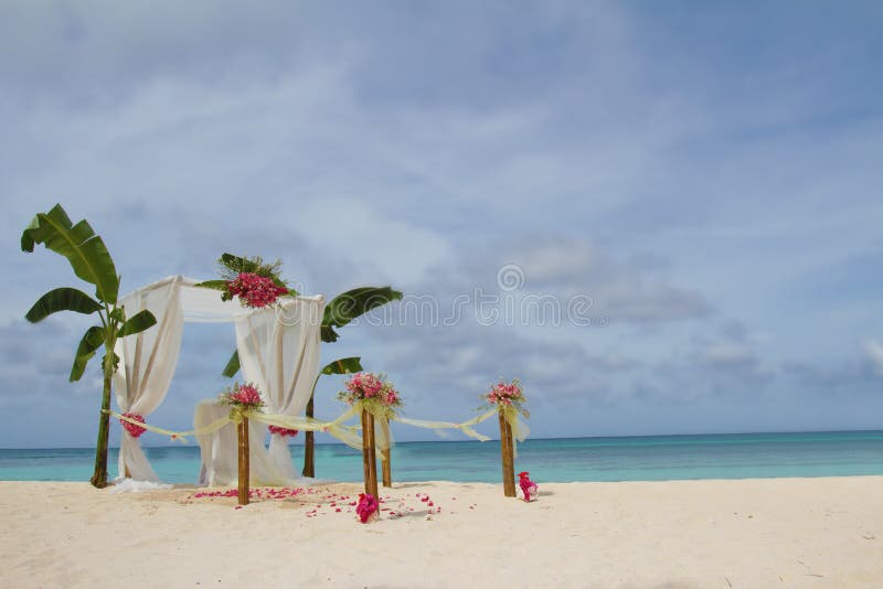 Wedding Arch and Set Up with Flowers on Tropical Beach Stock Photo ...