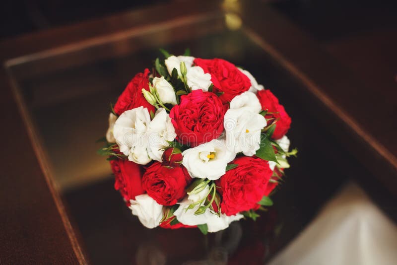 Wedding Bouquet of Red and White Roses on Table Stock Photo - Image of ...