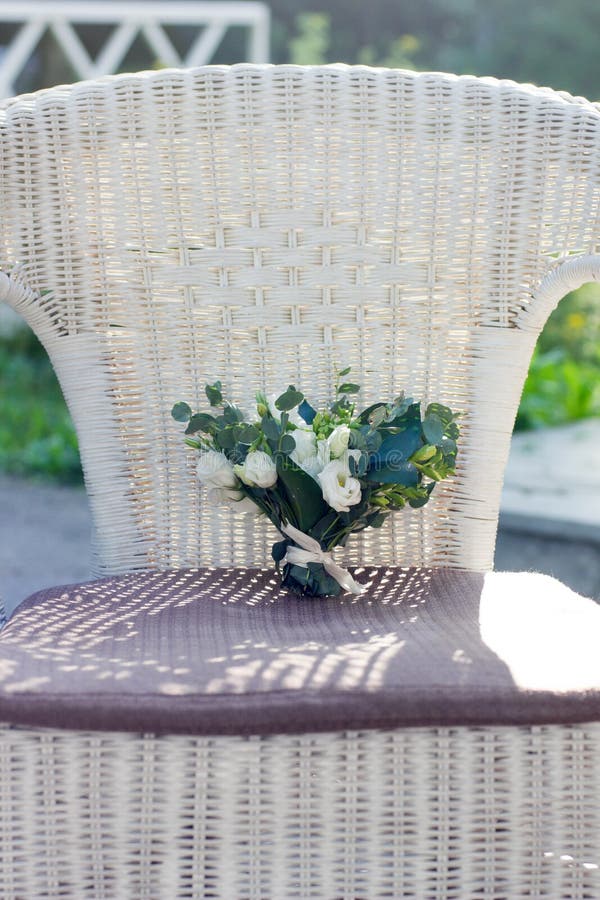 Wedding Bouquet of White Flowers on the White Chair Stock Photo - Image ...