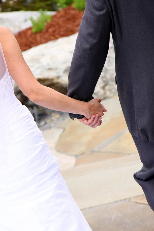Wedding - Bride and Groom Holding Hands Stock Image - Image of wedding ...