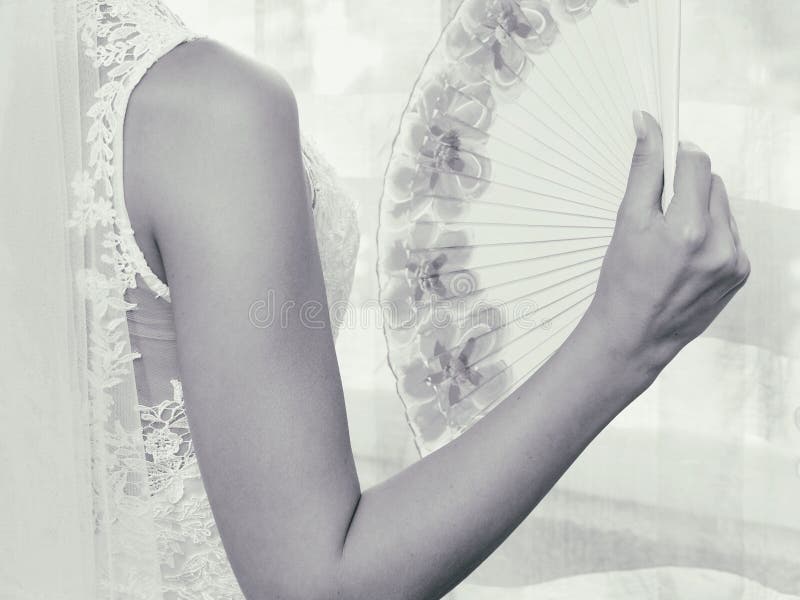 Wedding Bride Holding a Fan in Her Hand Stock Photo - Image of attitude ...