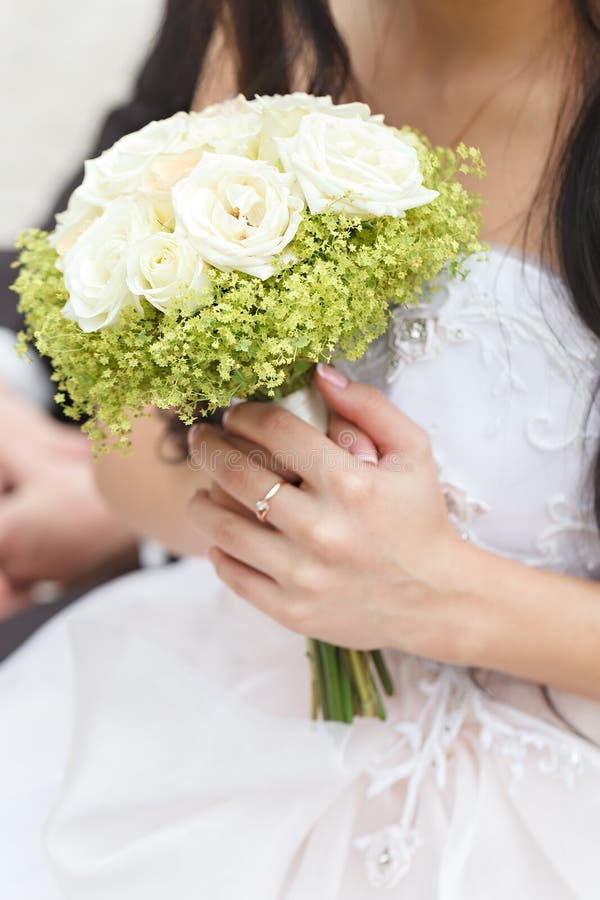 Wedding Bunch of Flowers in Hands of Bride Stock Photo - Image of ...