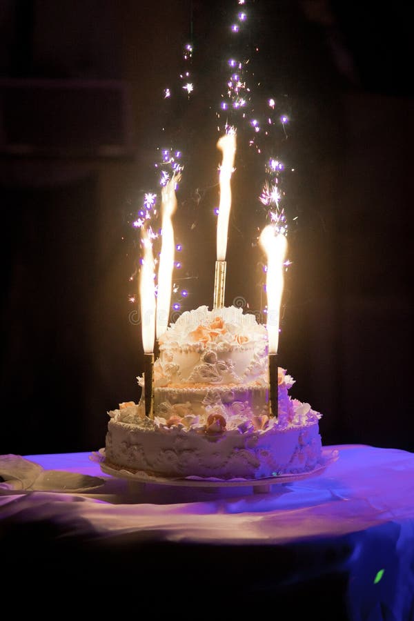 Wedding Cake with Candles and Fireworks Light Stock Photo - Image of ...