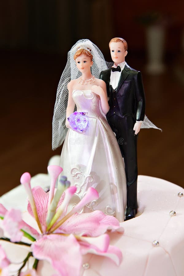 Wedding Cake with Models of Bride and Groom Stock Image - Image of ...