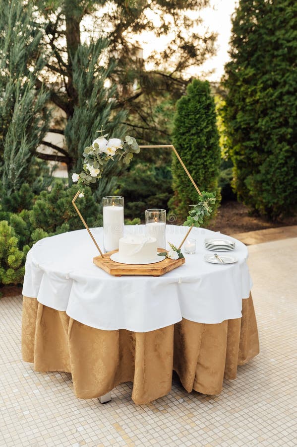 Wedding Cake for Newlyweds on a Wooden Stand Stock Photo - Image of ...