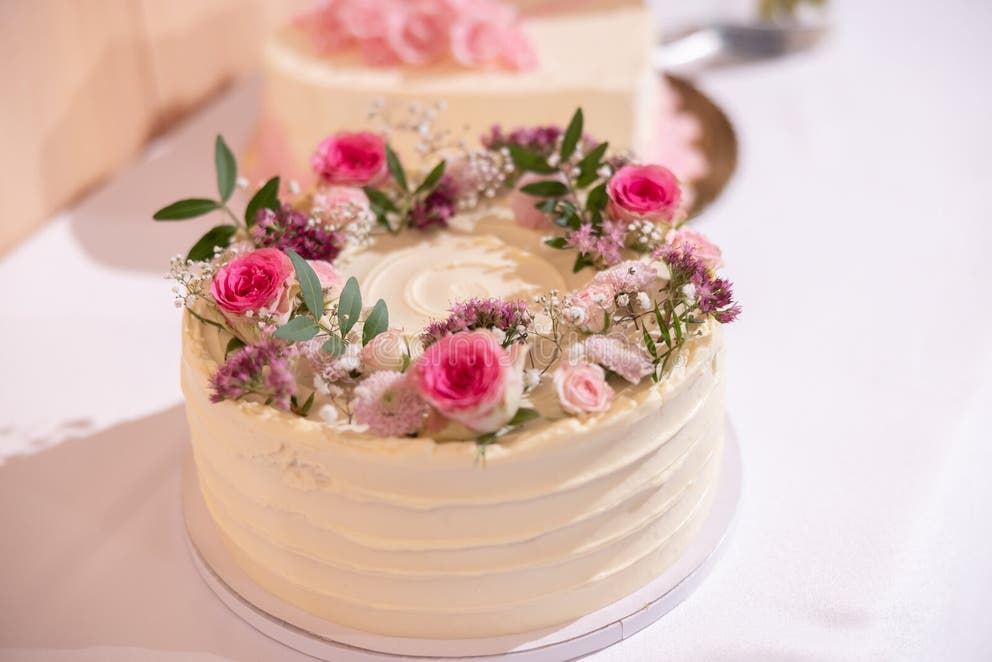 Wedding Cake with Red Marzipan Roses on the Wedding Table Stock Photo ...