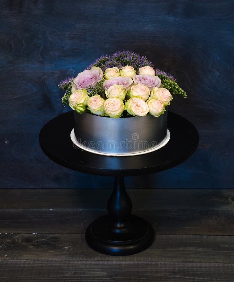 Wedding Cake with Silver Chocolate Border and Roses Stock Image - Image ...