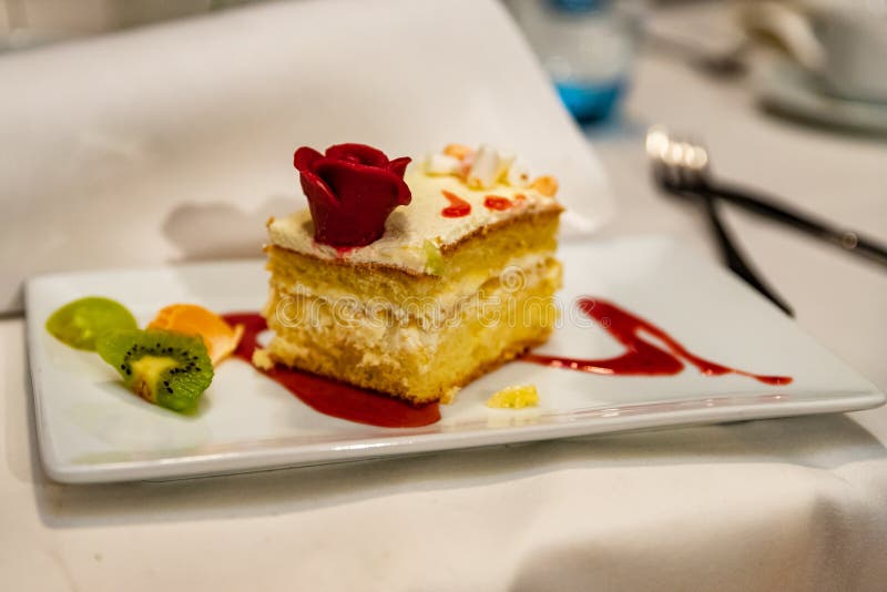 Wedding Cake Slice with Red Rose Stock Image - Image of cake, rose ...