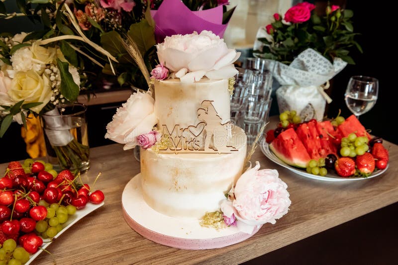 Wedding cake and sweets stock photo. Image of baking - 270187100