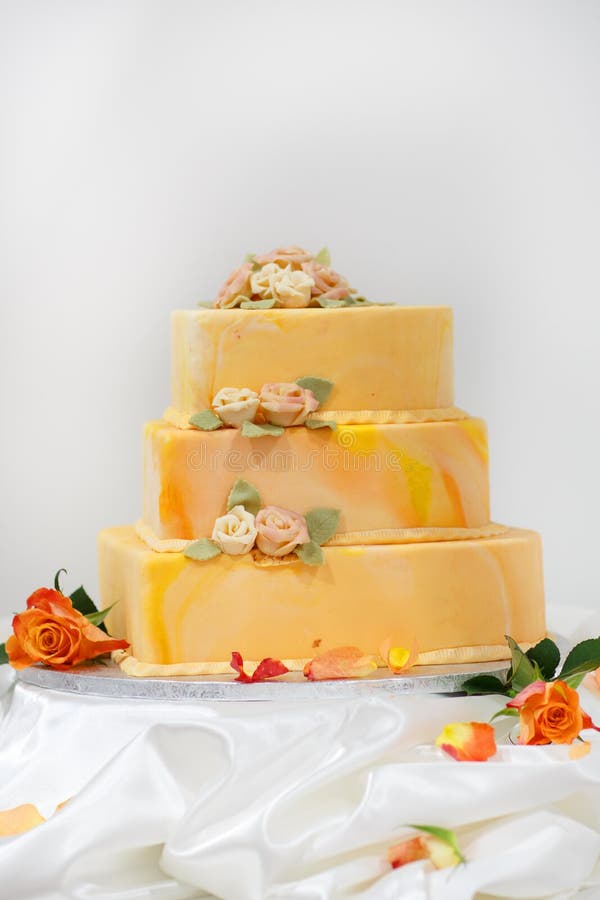 Wedding Cake in Yellow and Orange. Stock Photo - Image of outdoors ...