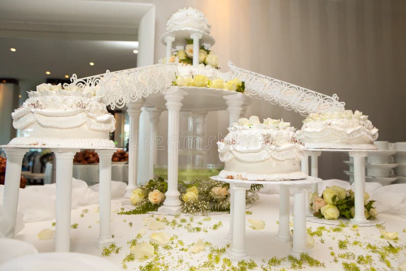 Wedding Cakes with Roses Connected by Bridges Stock Image - Image of ...