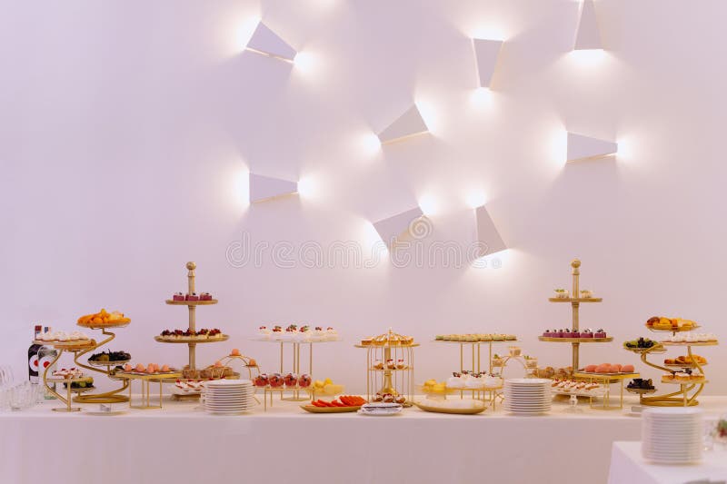 Wedding Candy Bar Decoration Setup with Delicious Cakes and Sweets ...