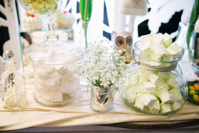Wedding Candy Bar with White Flowers in Rustic Style Stock Photo ...