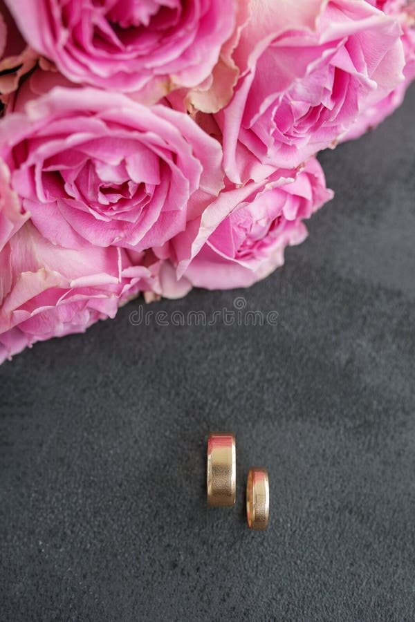 Wedding Card with Pink Flowers and Wedding Rings Stock Photo - Image of ...