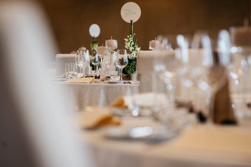 Wedding Celebration with Tables Topped with an Array of Empty Glasses ...