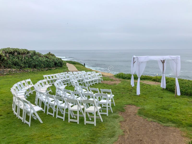 Wedding Ceremony Setting in the Garden in Front of the Ocean Stock ...