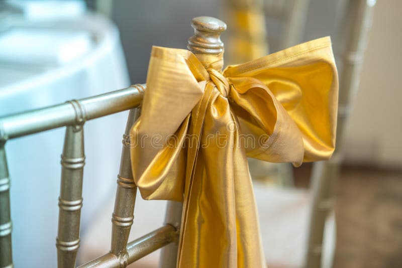 Wedding Chair Decoration with Gold Bows Stock Image - Image of ...
