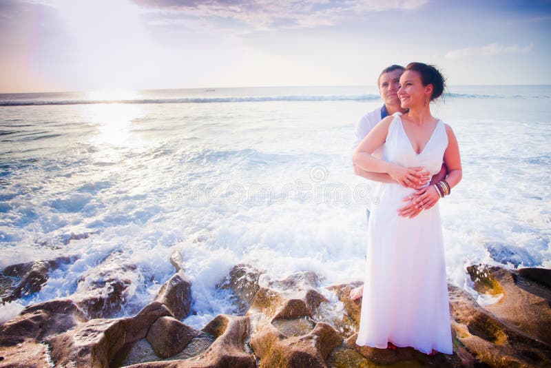 Wedding Couple at the Beach Stock Image - Image of summer, dress: 53020733