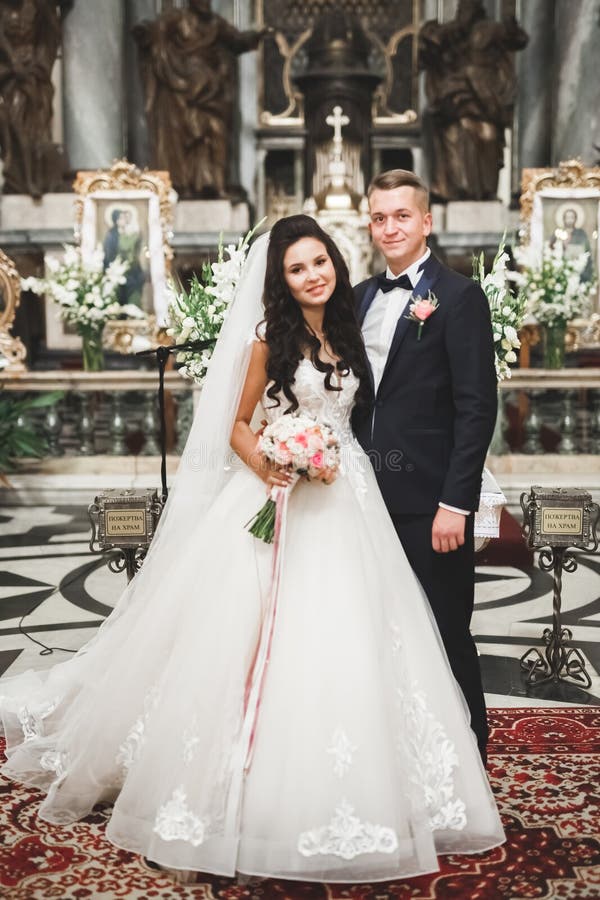 Wedding Couple Bide and Groom Get Married in a Church Stock Image ...