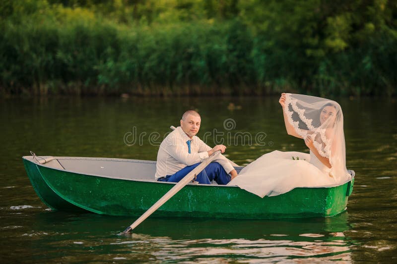 Wedding Couple on a Boat on the Lake Stock Image - Image of husband ...