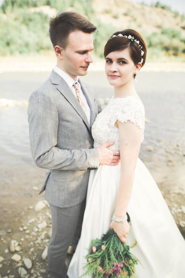 Wedding Couple Bride and Groom Holding Hands Stock Photo - Image of ...