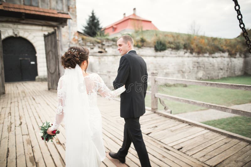 Wedding Couple Bride and Groom Holding Hands Stock Photo - Image of ...