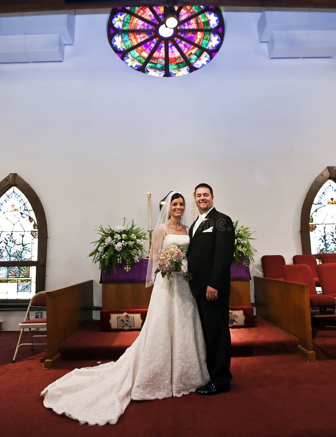 Bride and Groom in a Church Stock Image - Image of married, groom: 15765427