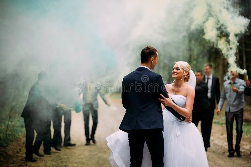 Wedding Couple with Color Smoke in the Summer Park. Stock Image - Image ...