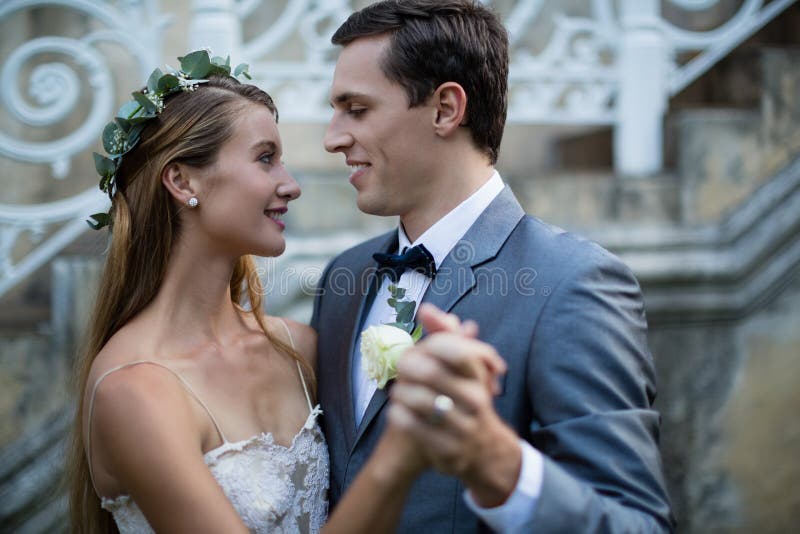 Wedding Couple Dancing Face To Face Stock Photo - Image of closeness ...