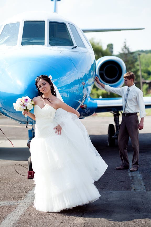 Wedding Couple Fly on Honeymoon Stock Image - Image of honeymoon, bride ...