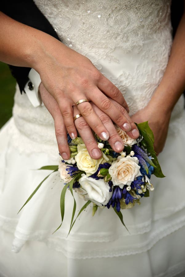 Wedding Couple Hand in Hand Stock Photo - Image of bridal, bride: 168303688