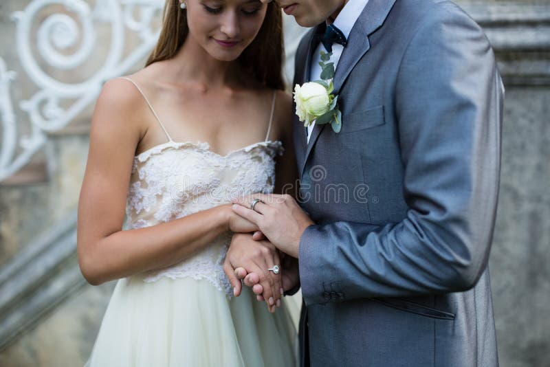 Wedding Couple Holding Hands Stock Image - Image of caucasian, dress ...