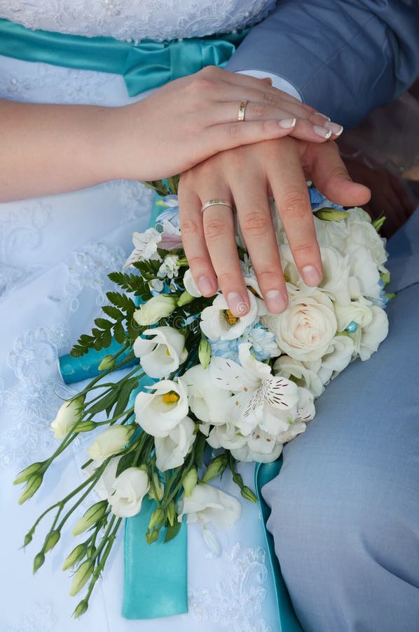 Wedding Couple Showing Rings Stock Photo - Image of groom, marry: 42340988