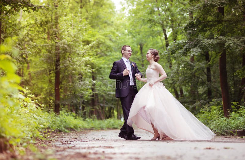 Wedding couple on a walk stock photo. Image of vintage - 48859670