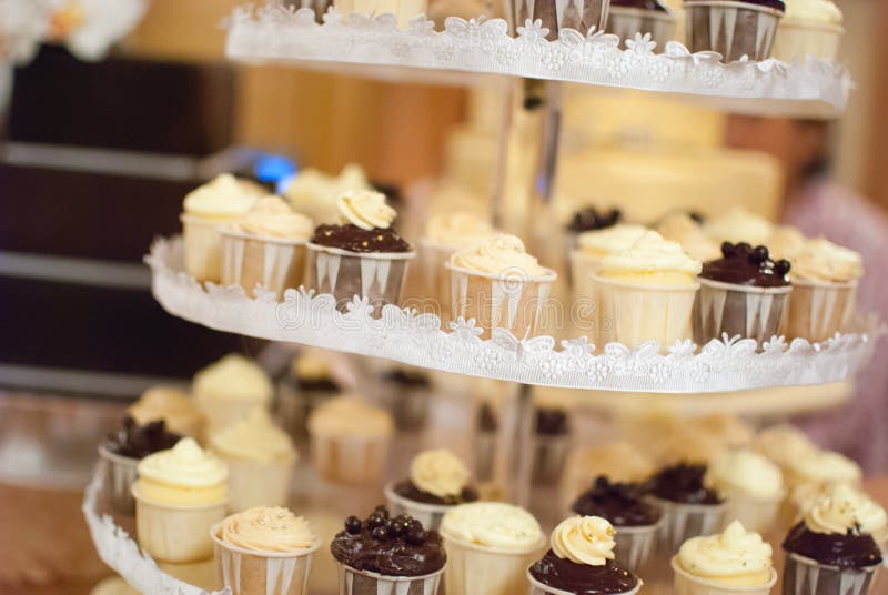 Wedding Cup Cakes on a Multi-level Tray Stock Image - Image of ...