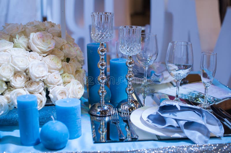 Wedding Decor in Blue. Candles and Flowers on the Table Stock Image ...